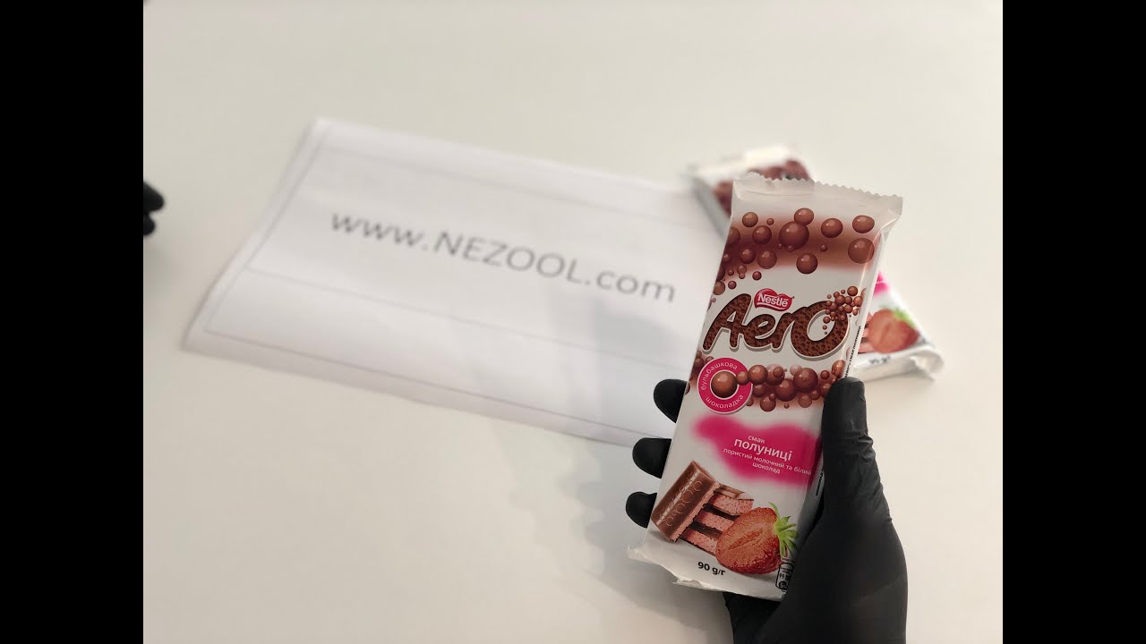 Nestle Aero Air Milk & White Chocolate with Strawberry Filling - YouTube