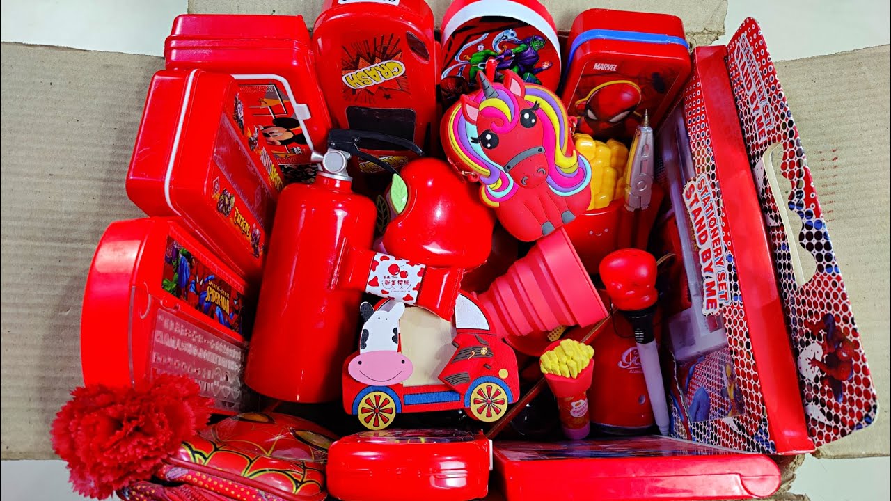 Box full of cute red stationery items, pencil box, toy & gadgets ...