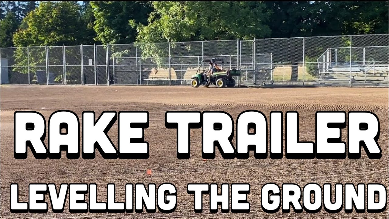 Levelling the playground with rake trailer connected to a truck - YouTube