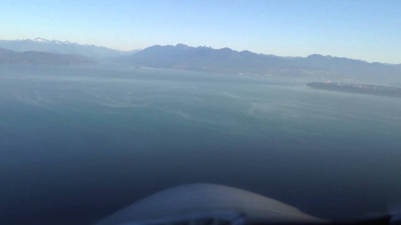 Vancouver BC: eclipse jet visual approach 08R - YouTube
