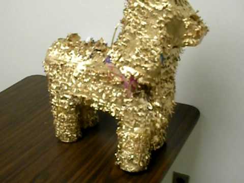 A golden donkey piñata - YouTube