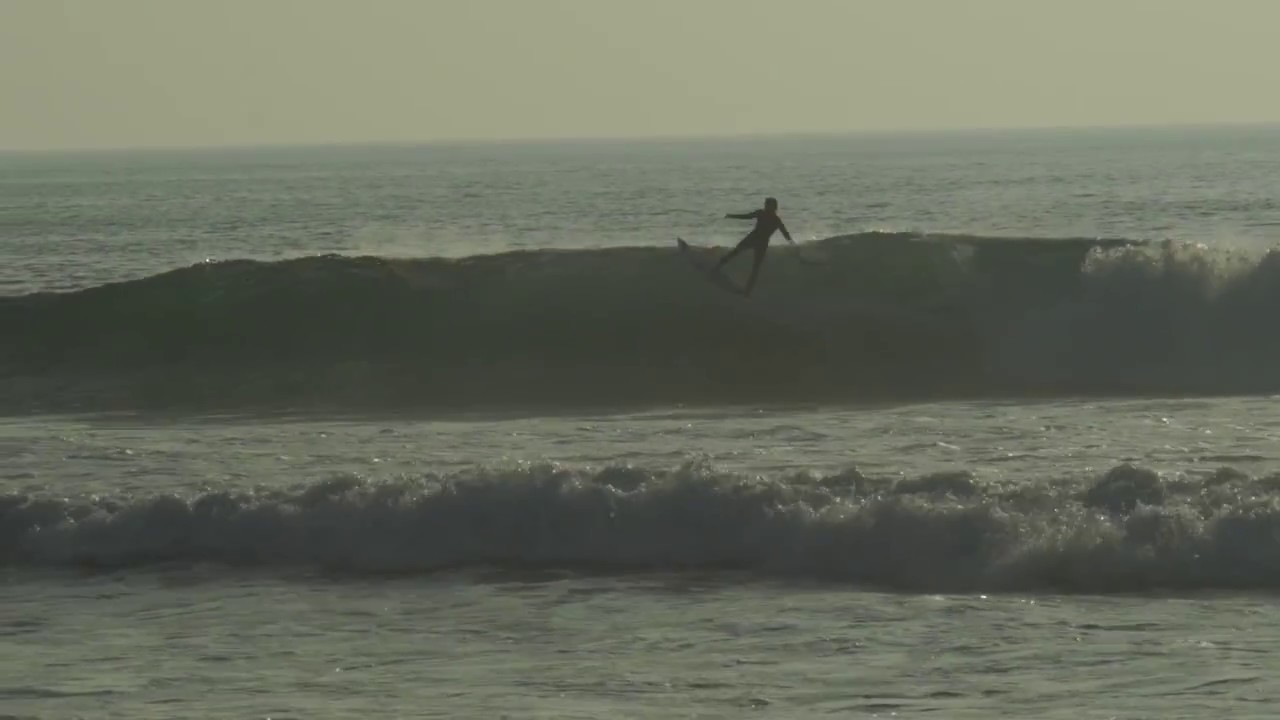 Surfing the Huntington Beach Pier at sunset. RAW FOOTAGE - YouTube