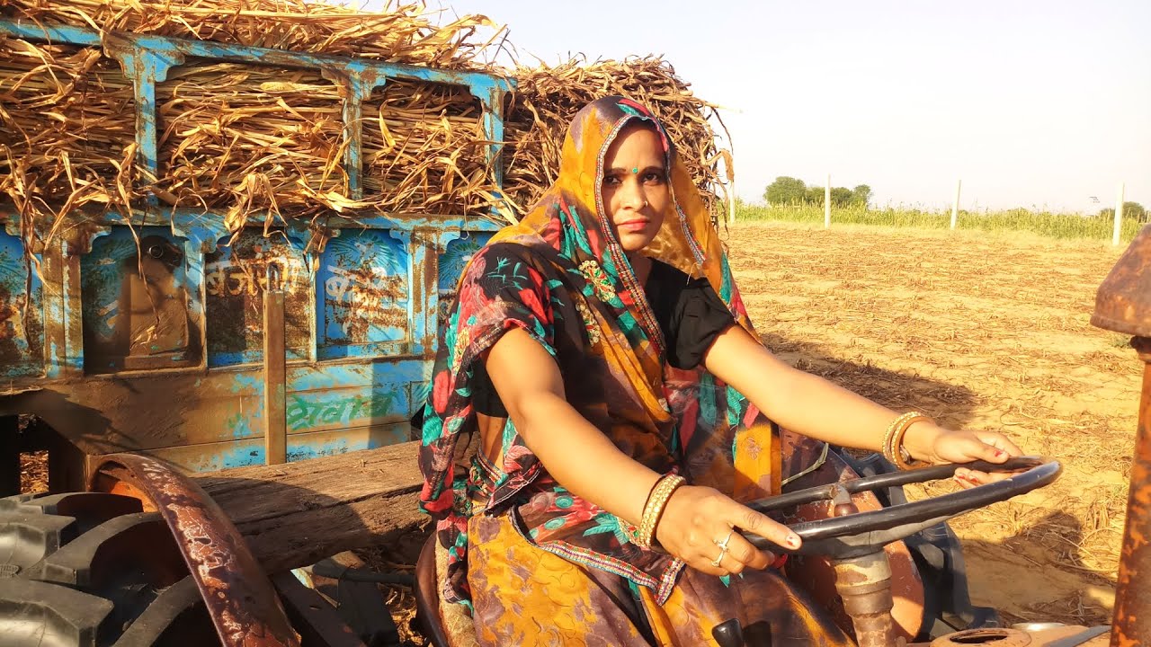 Village lady by tractor driving - YouTube