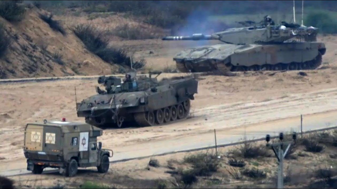 Israeli military vehicles manoeuver near near the Gaza border | AFP ...