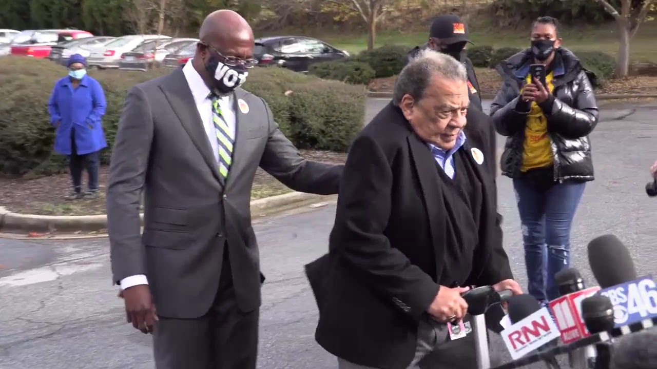 Ambassador Andrew Young, Raphael Warnock vote on 1st day of Ga. early ...