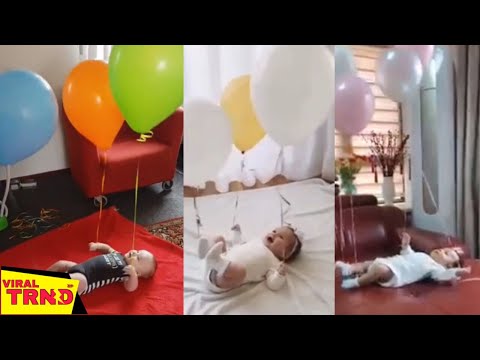 Baby Laughs at Balloons Tied to Hands and Feet |  Viral TRND Videos