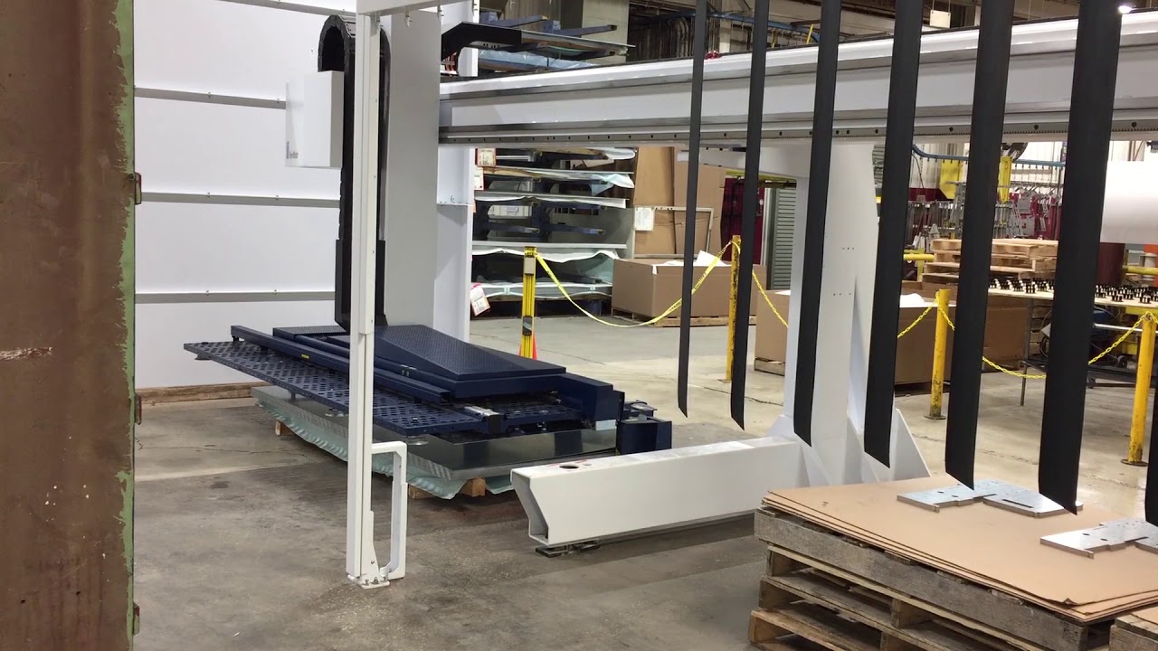TRUMPF Machine Loading Sheet Metal at HUI Manufacturing - YouTube