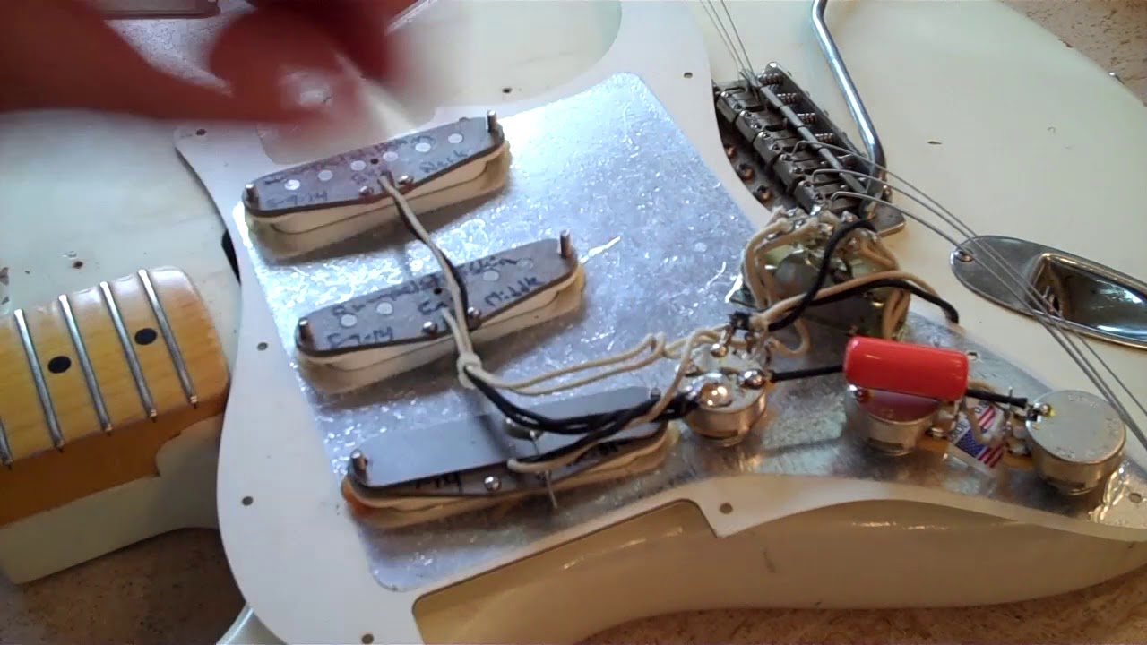 Installing a Strat Bridge Pickup Base Plate - YouTube
