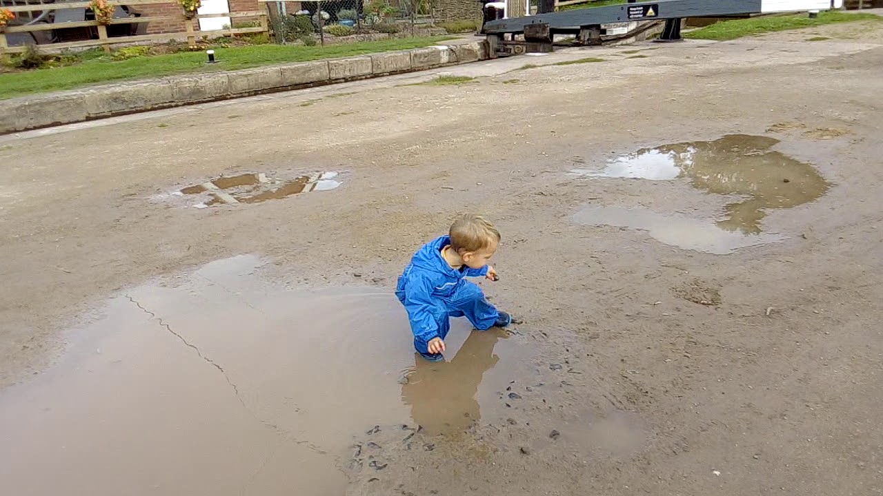 Thoroughly enjoying jumping in muddy puddles at Tyrley Locks - YouTube