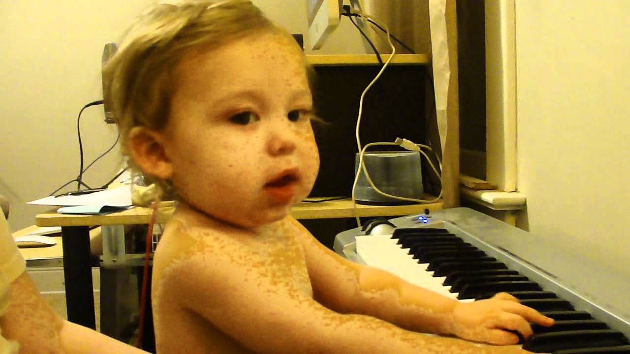 My adorable baby girl rocking out on the piano. - YouTube