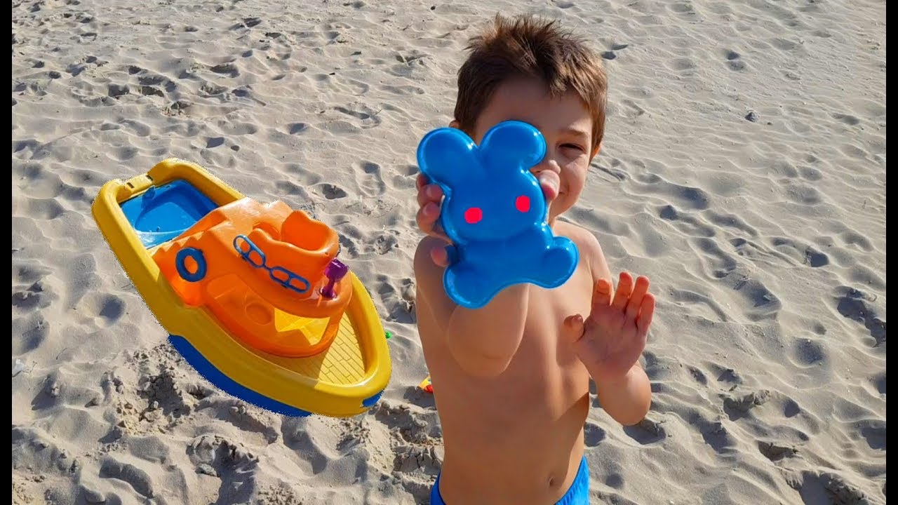 Kids playing on the beach with sand and toys. Funny video - YouTube