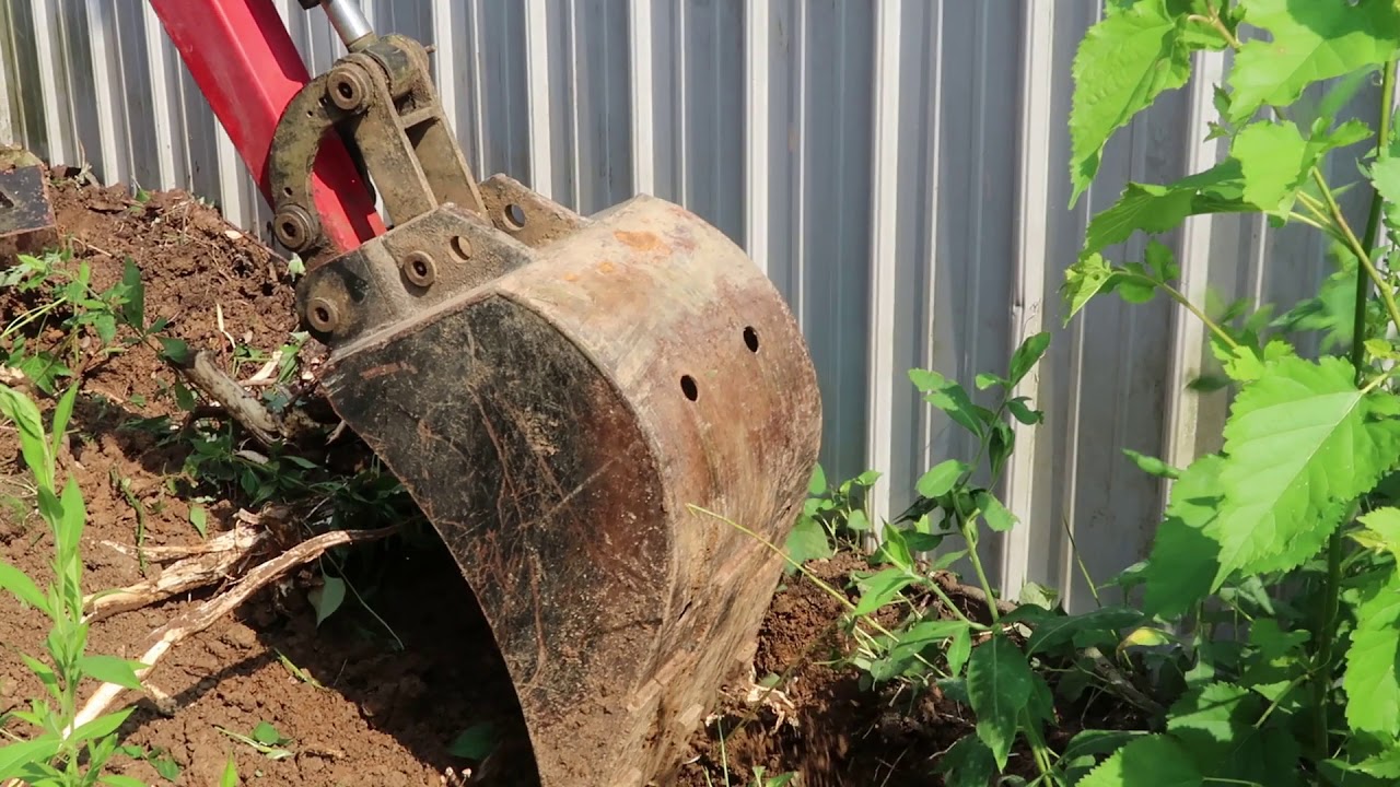 First Use of Backhoe - YouTube