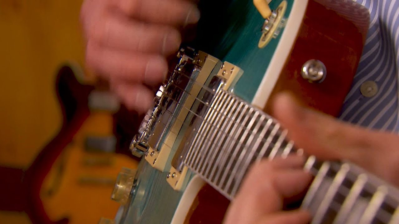 Shengze guitars from China try to strike a chord overseas - YouTube