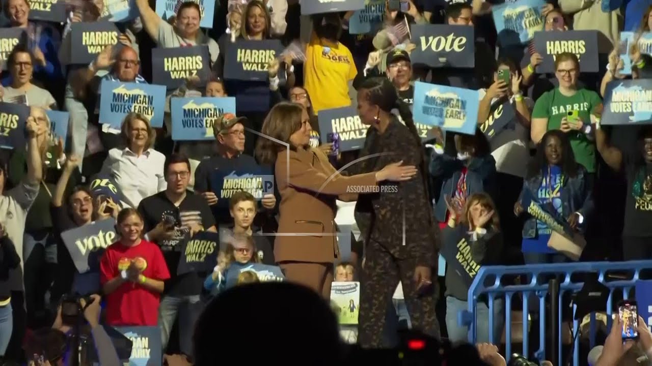 Harris joined on stage by Michelle Obama in Michigan, warns over ...