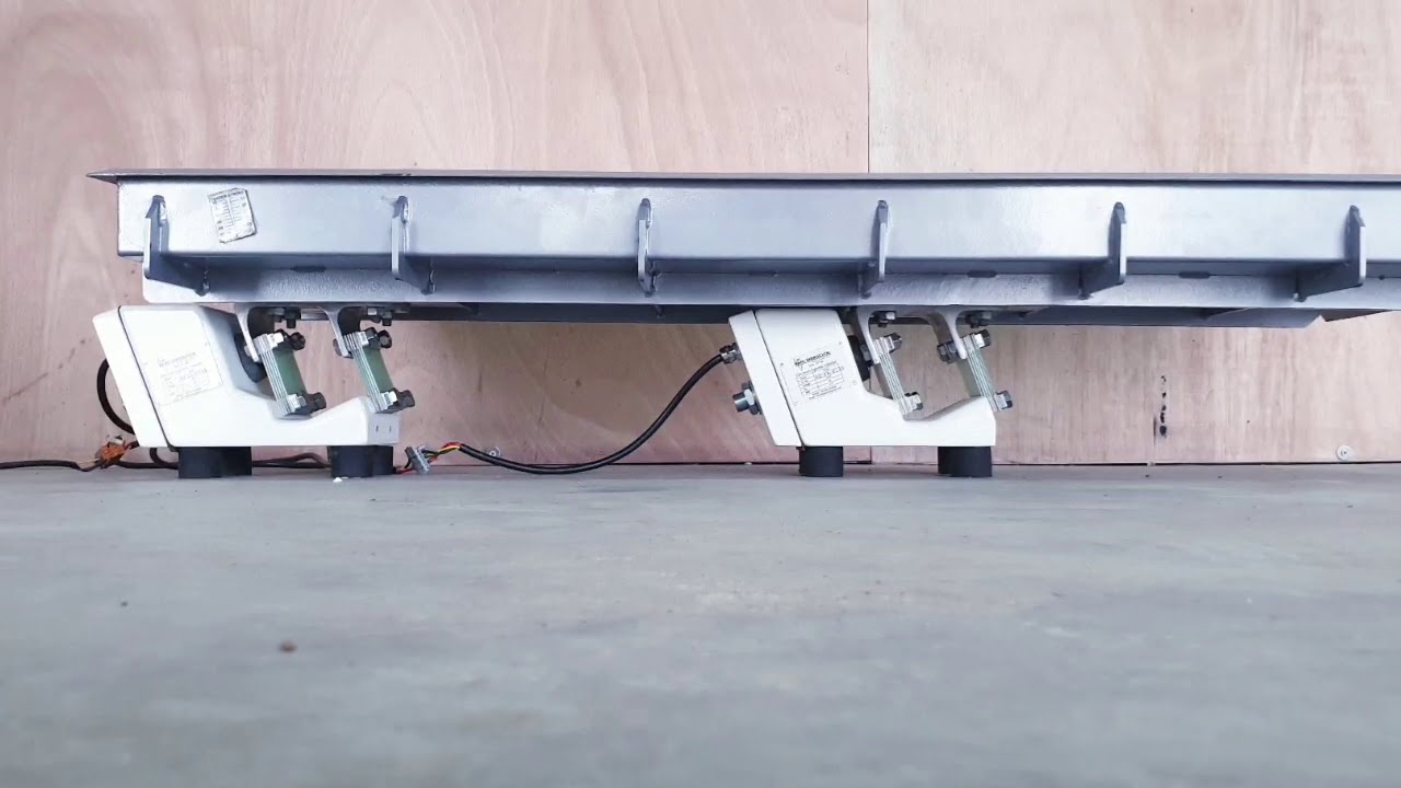 Emag Vibratory Conveyor - YouTube