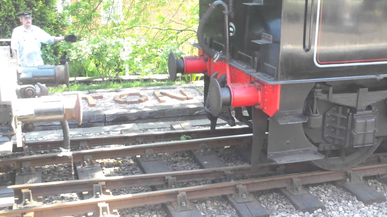 BR 'Black 5' 45379 buffers up to her goods train - YouTube