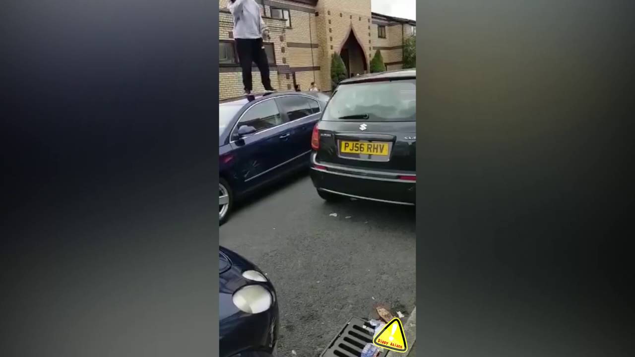 Crazy Asian Woman Jumps On A Taxi | Oldham - YouTube