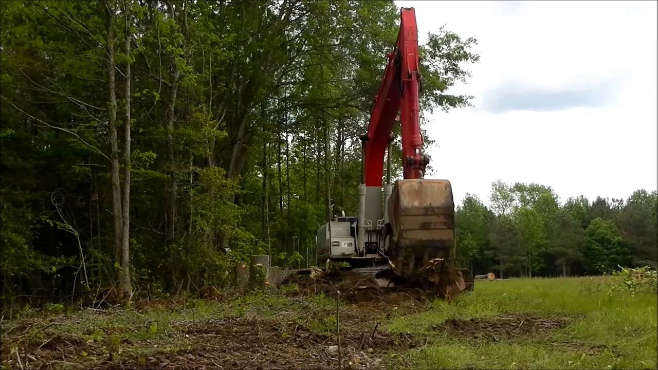 Linkbelt 2800Q Excavator Clearing Trees - YouTube