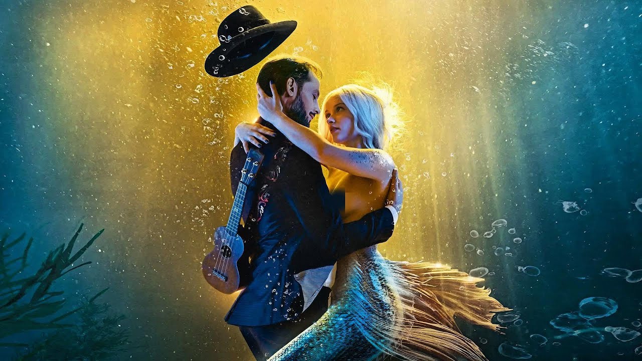 Man takes mermaid on an aquarium date; they dance romantically ...