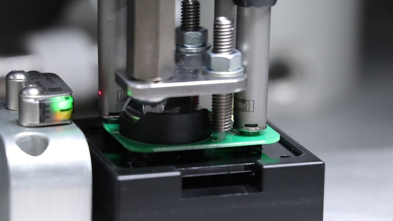 Staking a circuit board and lens with nanoSTAKE - YouTube