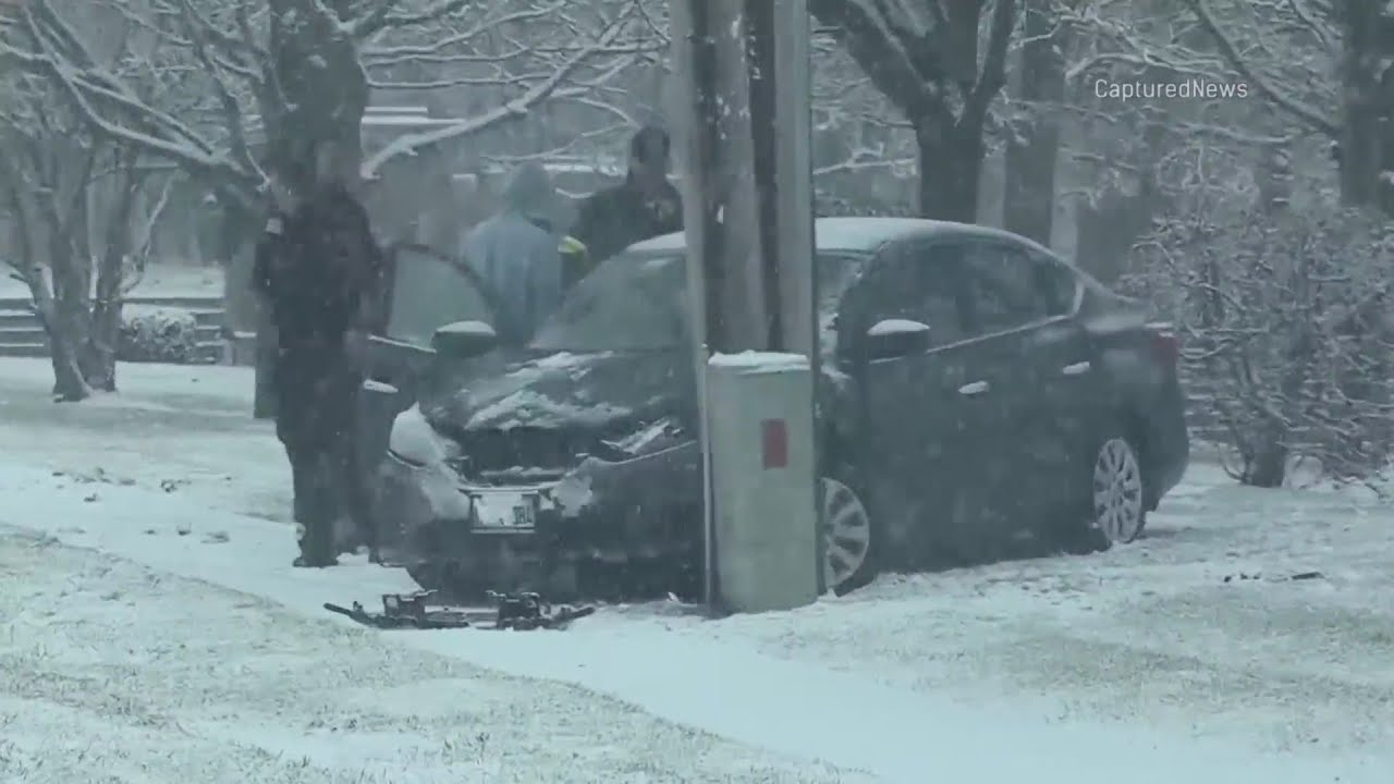 Snow cause problems on suburban roadways - YouTube