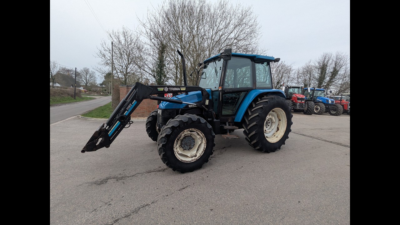 NEW HOLLAND 7635 WITH TRIMA 1192 LOADER - YouTube