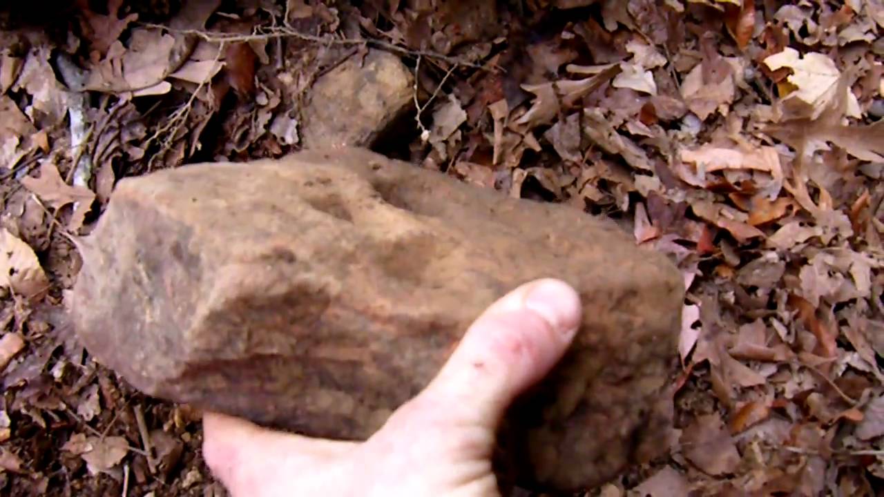 nutting stone . . .rock shelter - YouTube