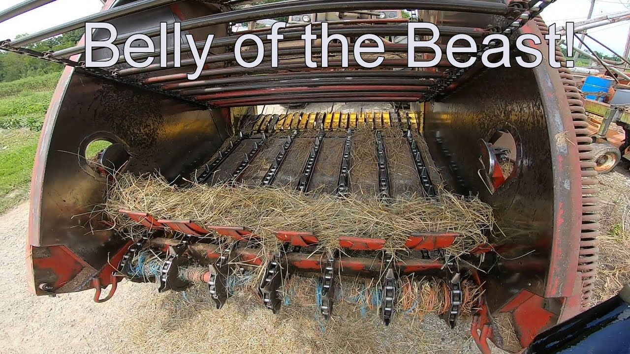 Inside Views of Old New Holland Chain Baler Rolling Hay - YouTube