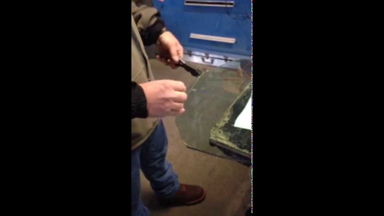 Cutting flat automobile window glass at Kidwell's Glass - YouTube