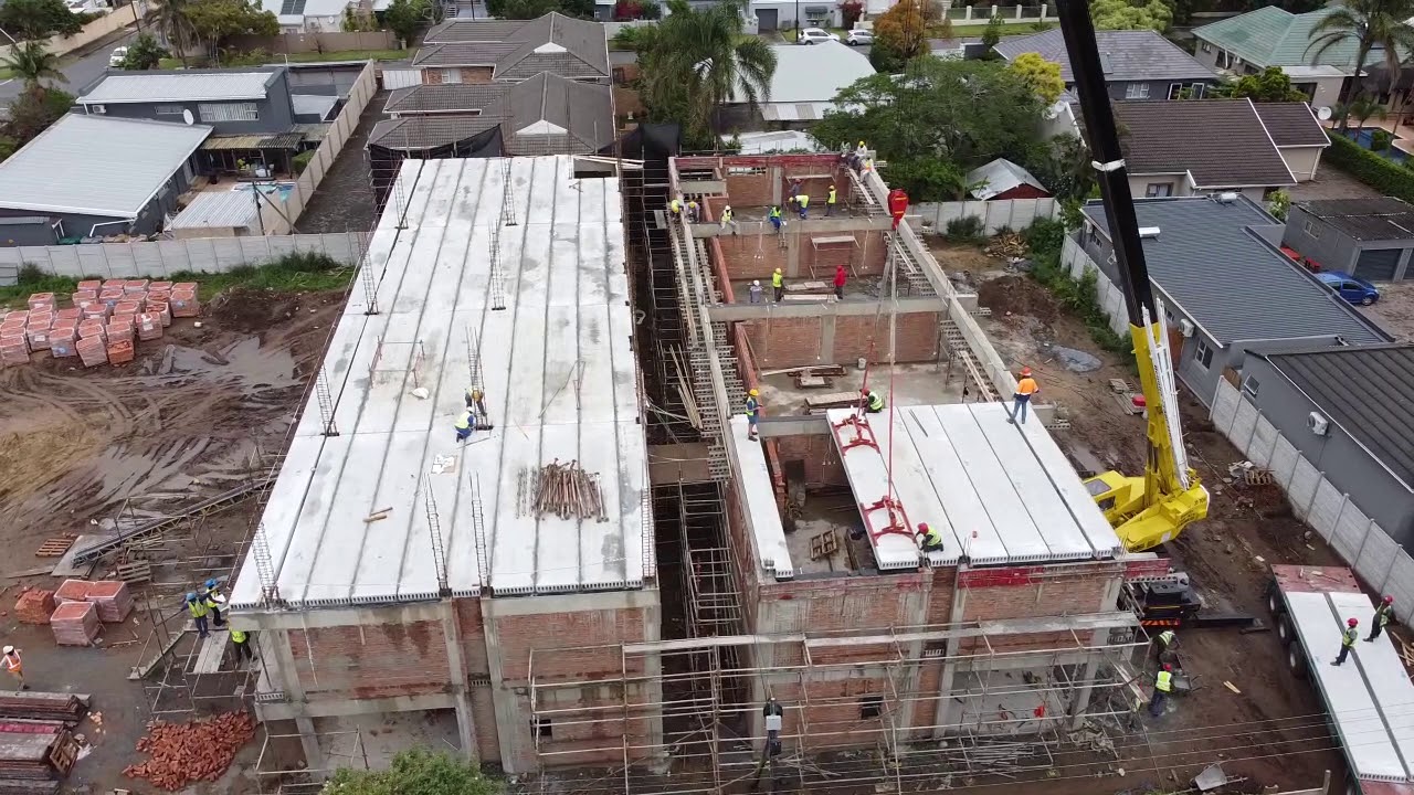 Shukuma Flooring Pre-Stressed Concrete Slabs - YouTube