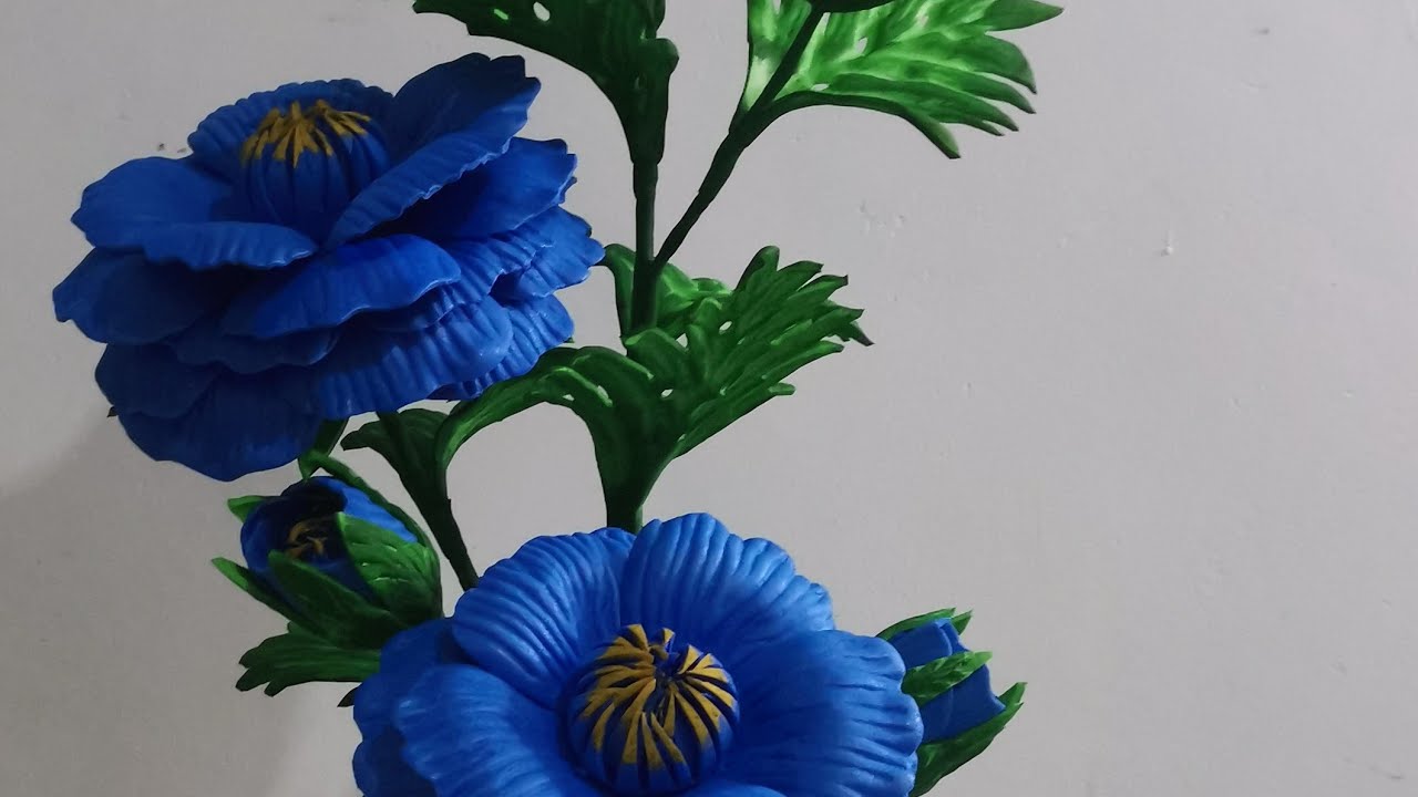 Como fazer uma linda flor em EVA utilizando frisador - YouTube