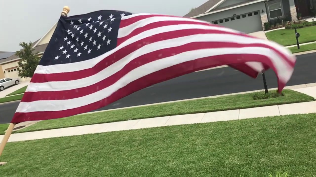The United States of America’s Flag Proudly flown in slow motion. - YouTube