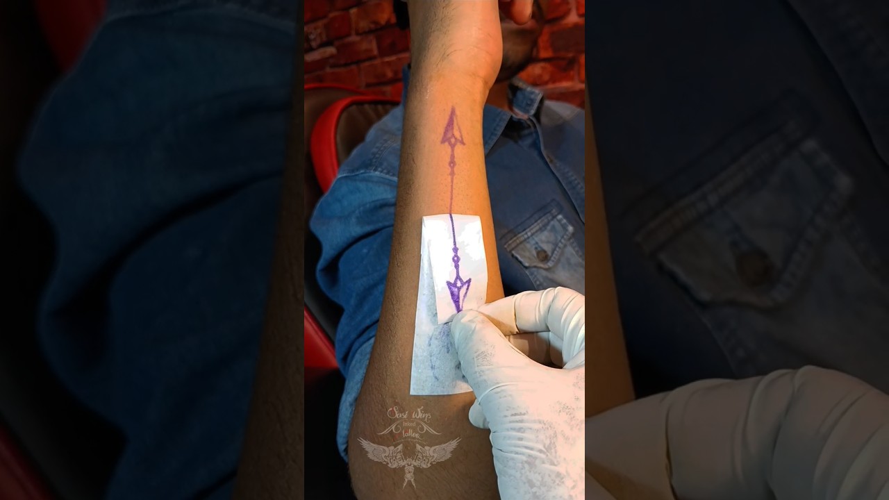 An arrow tattoo symbolizes strength, direction, and perseverance. # ...