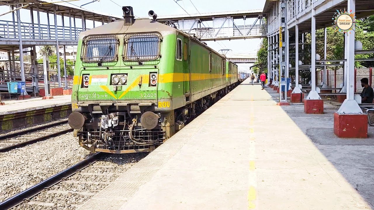 The iconic WAG 9 locomotive assumes control, guiding a long train and ...