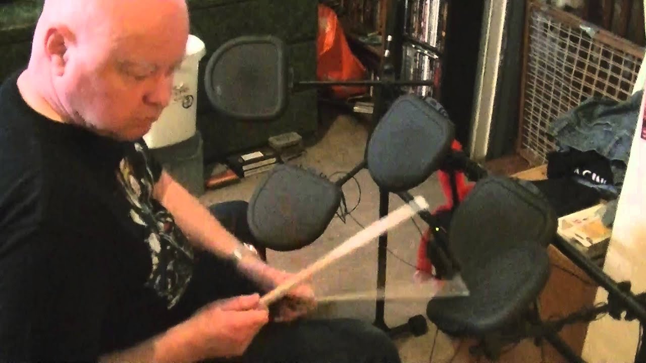 Nils playing my electronic kit - YouTube
