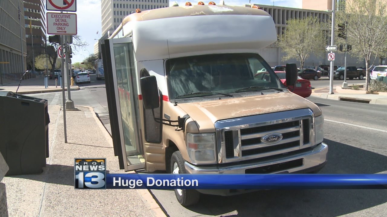 City donates van to refugee resource group - YouTube