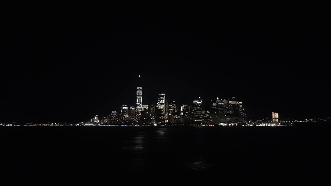 fascinating night view of Manhattan going to statten island - YouTube