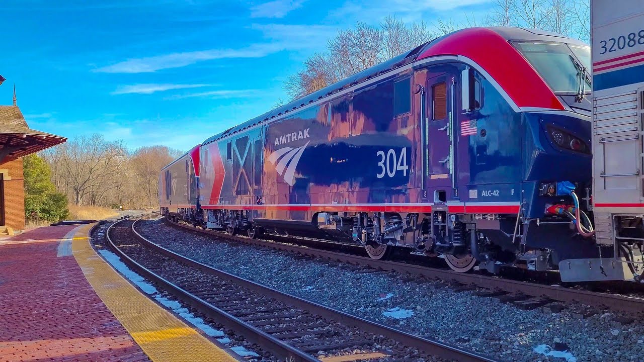 Amtrak Siemens ALC-42 chargers #304 and #305 trail on P030 at Point of ...