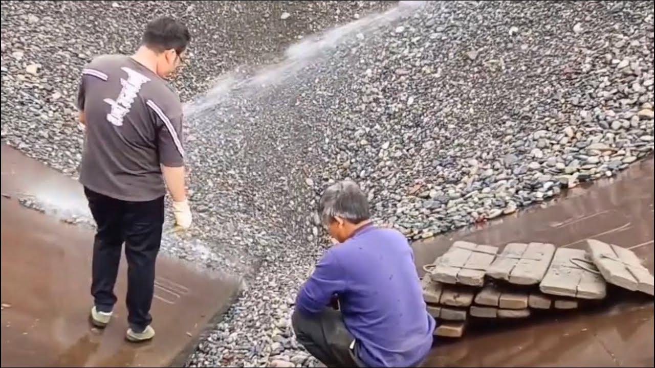 Barge unloading cobblestone - Relaxing videos , The flow of cobblestone ...