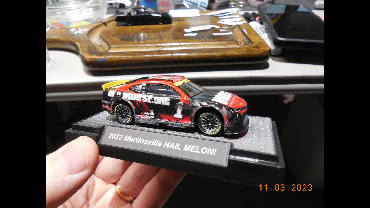 Final Touches on a 2022 Ross Chastain #1 Martinsville Hail Melon NASCAR ...