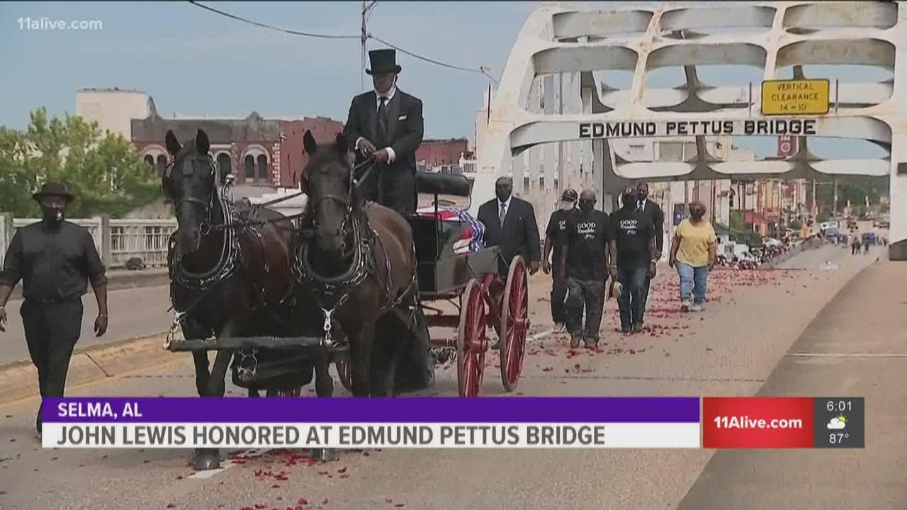 John Lewis crosses the Edmund Pettus Bridge one more time - YouTube