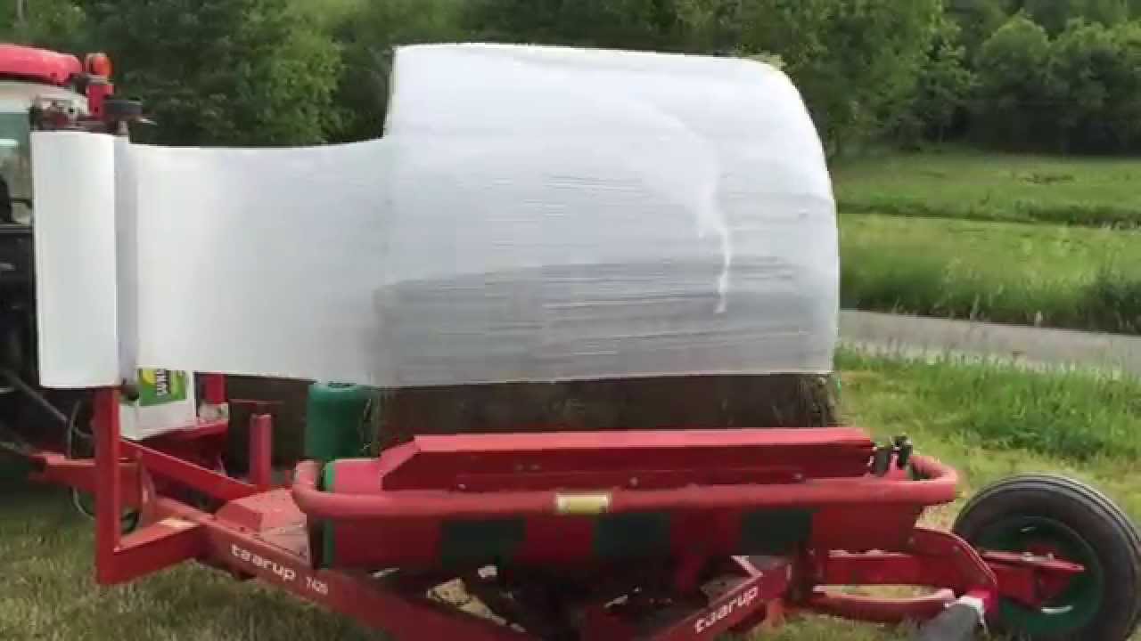 Wrapping Hay On The Farm with Kubota L5030 Tractor and Taarup 7420 ...