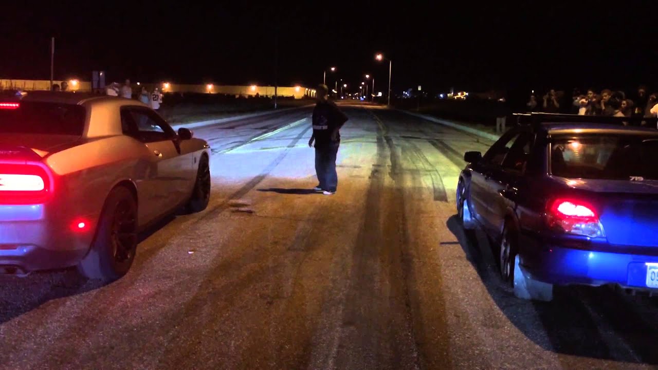 Hellcat vs sti - YouTube