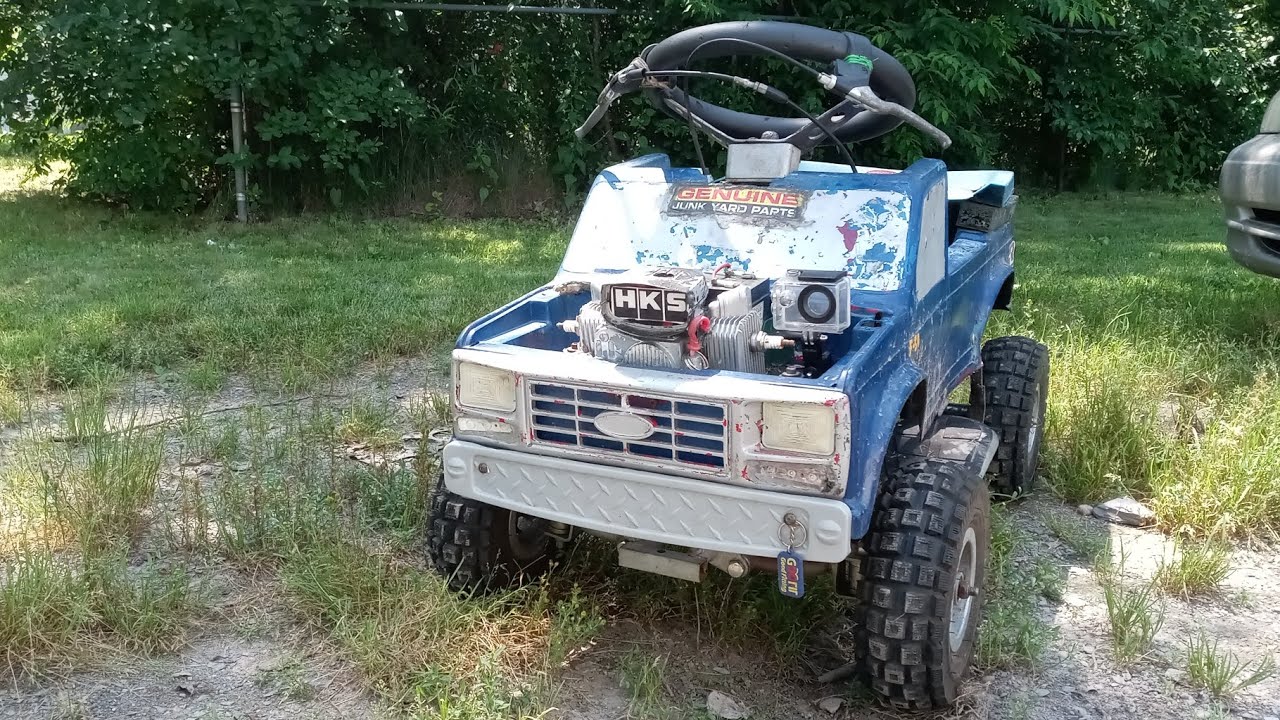 49cc fast power wheels Bigfoot.full speed driveway jump and offroading ...