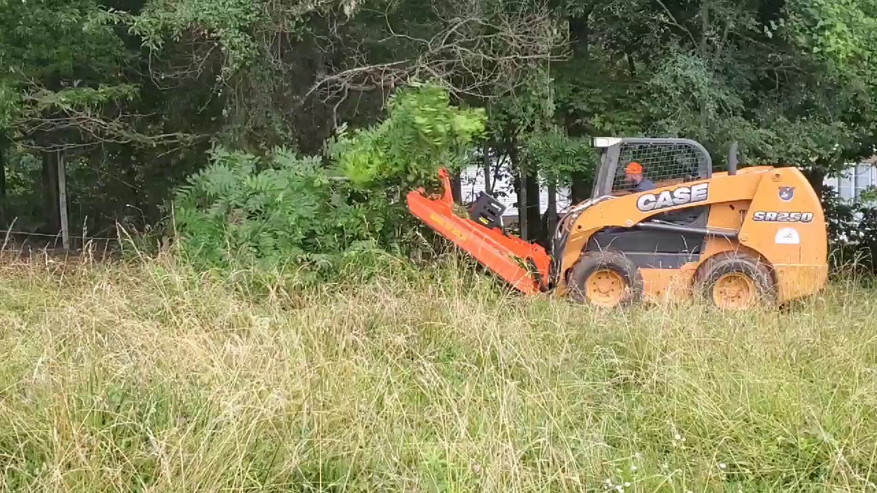 Carolina Attachments SDXC-10 shred black walnut tree - YouTube