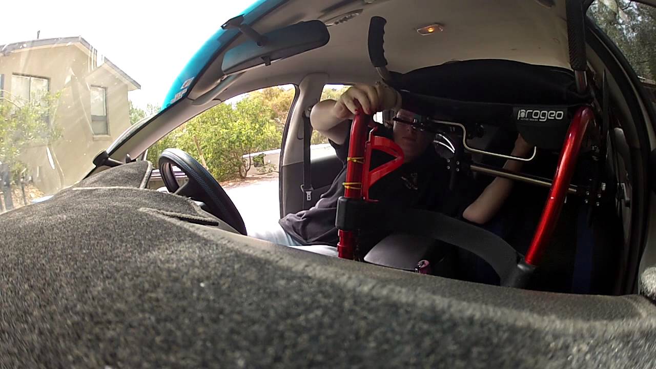 Loading and Unloading Rigid Frame Wheelchair from Car - YouTube