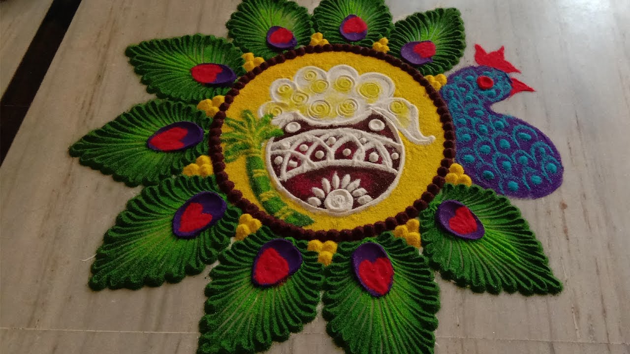 Beautiful & Colourful Sankranthi Special Pongal Pot & Peacock Rangoli ...