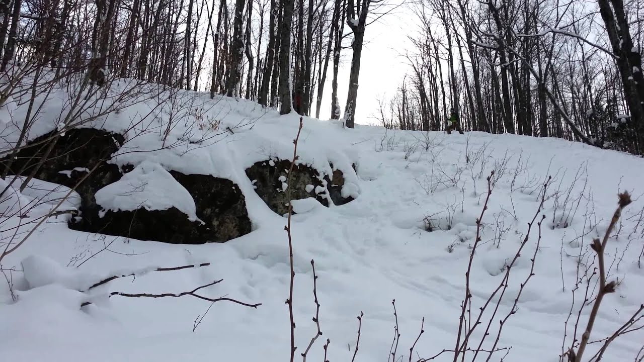 Mike Burke skiing off a 110 foot cliff - YouTube