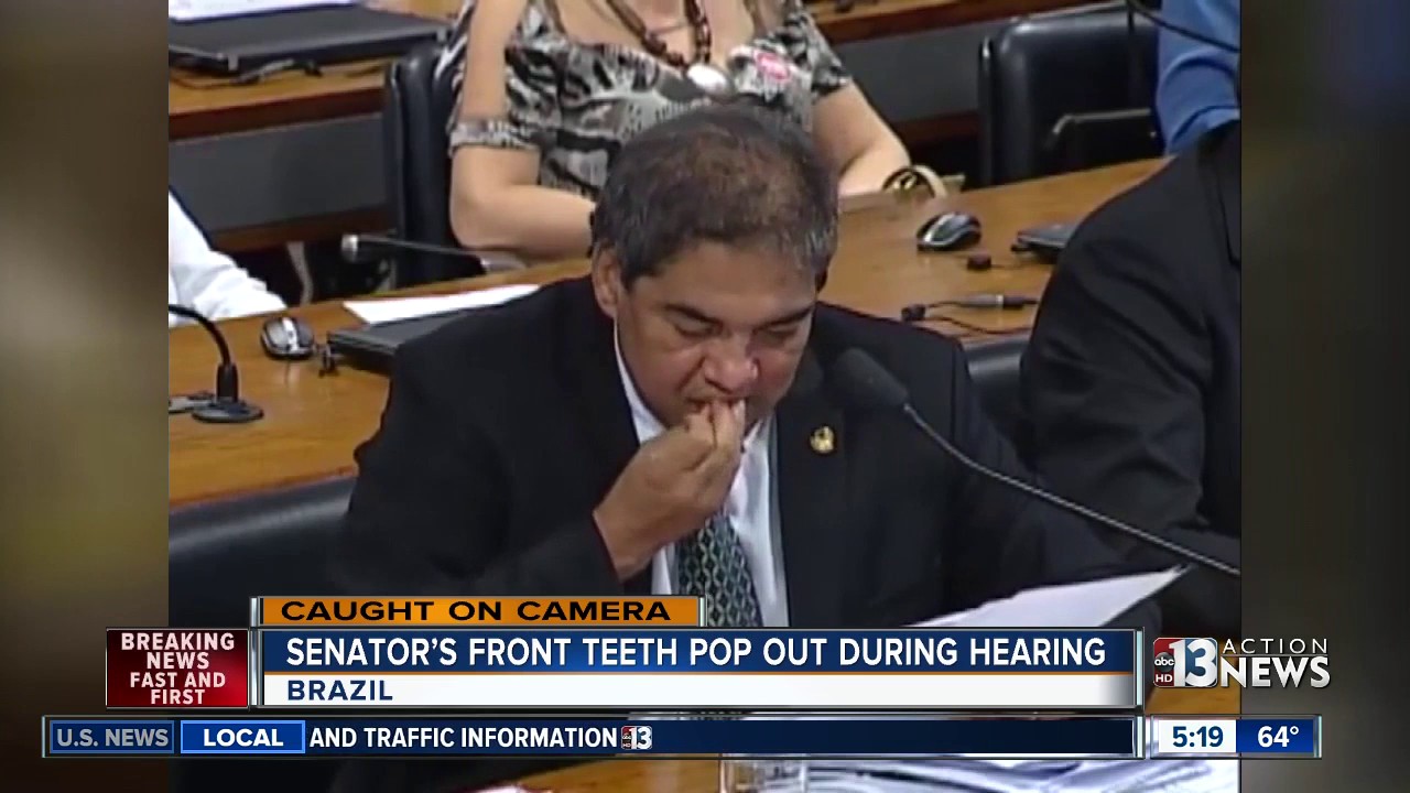 Senator's front teeth pop out during hearing - YouTube