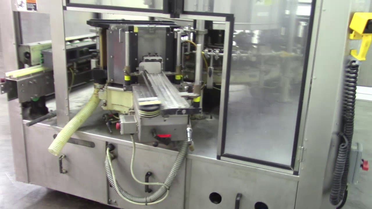 Krones Starmatic Front and Back Rotary Labeler - YouTube